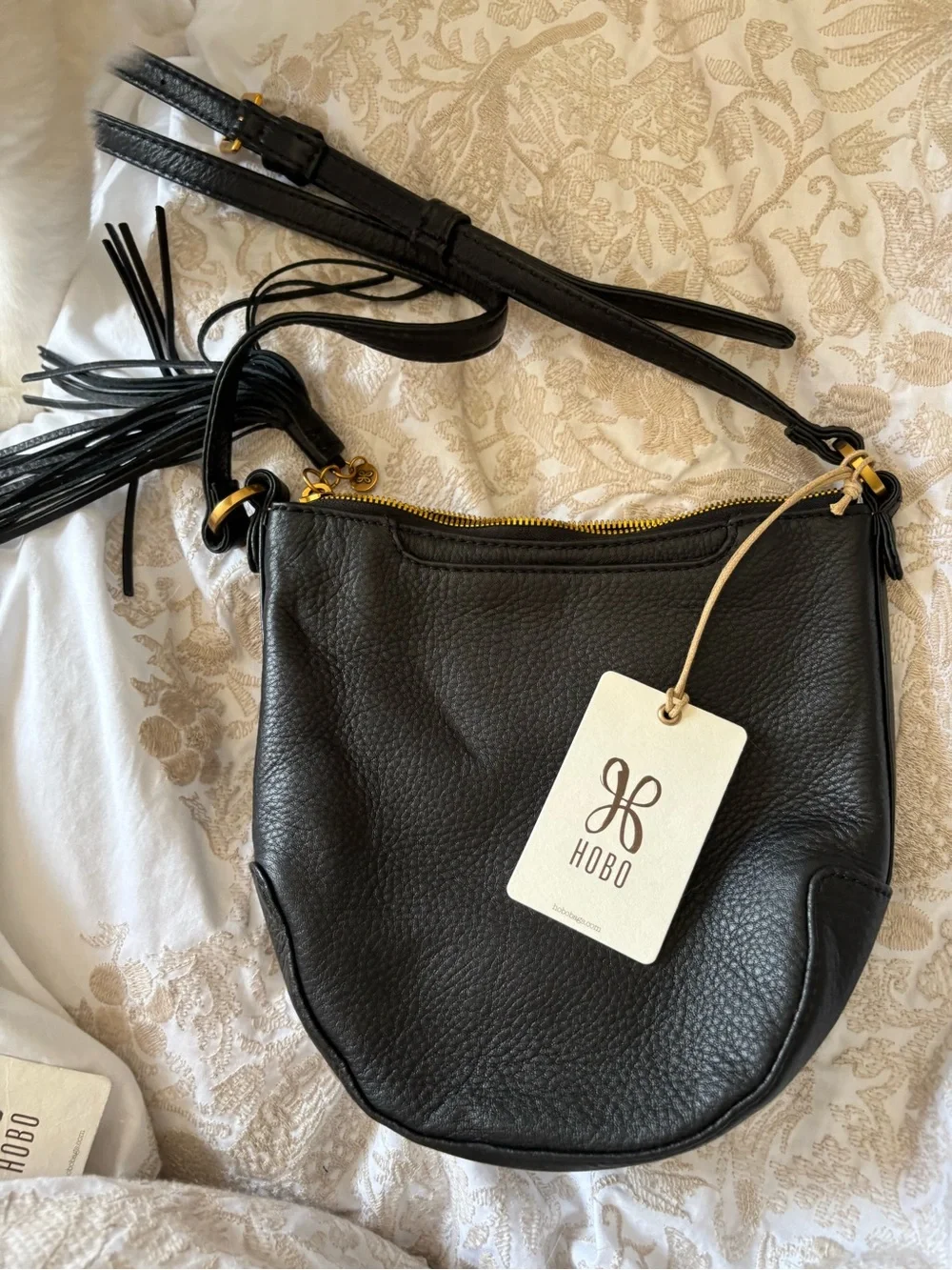 HOBO | Bags | Hobo Black Pebbled Leather Hobo Crossbody With Tassel ...